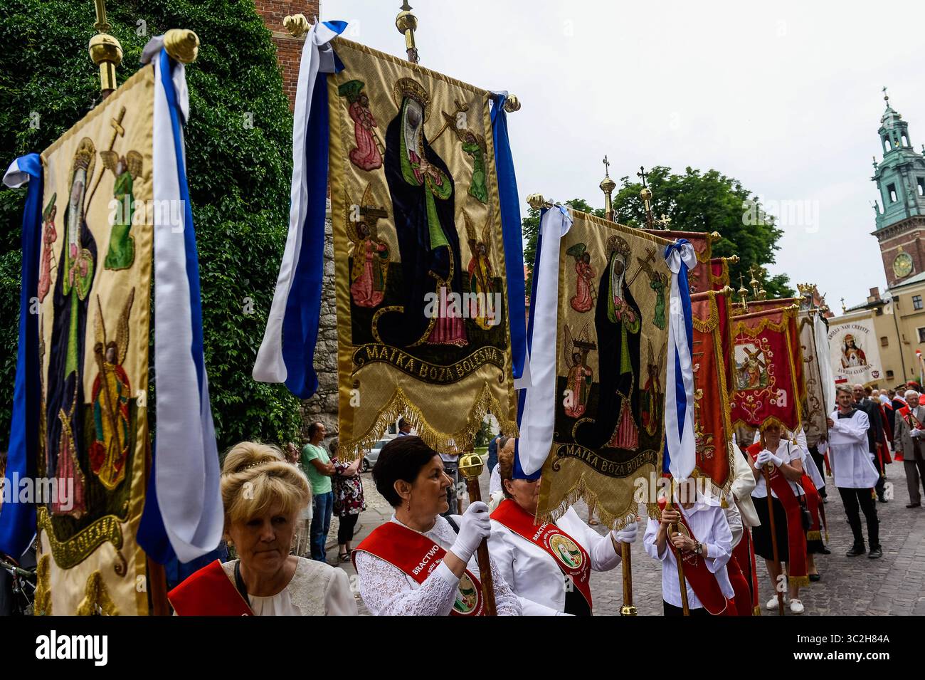 June 20, 2019 - Krakow, Poland - Believers hold religious symbols ...