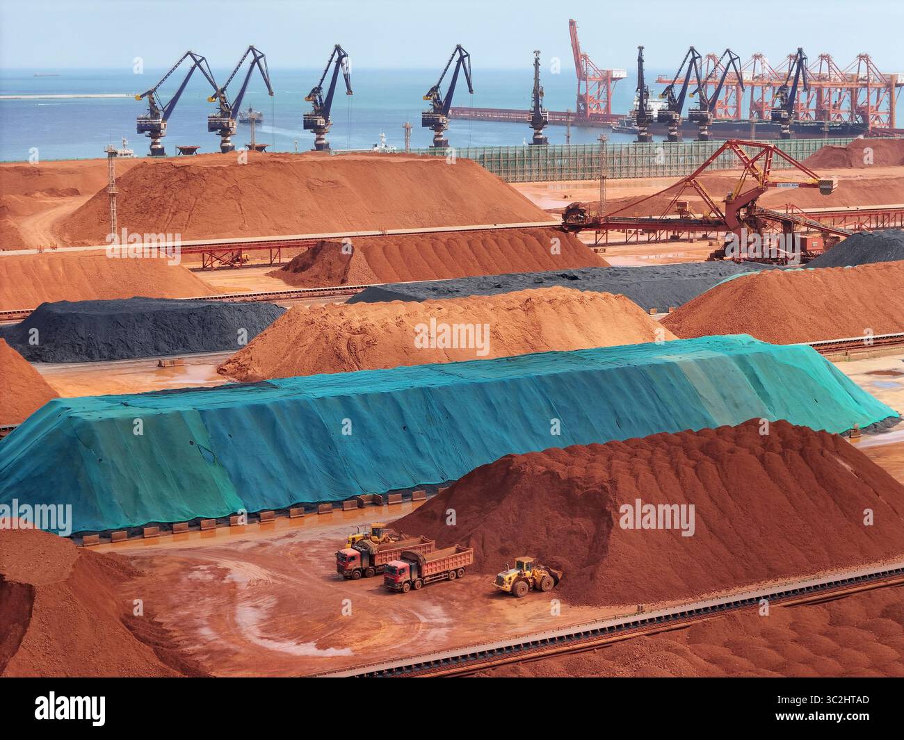 YANTAI, CHINA - JULY 24, 2025 - A large amount of imported iron ore ...