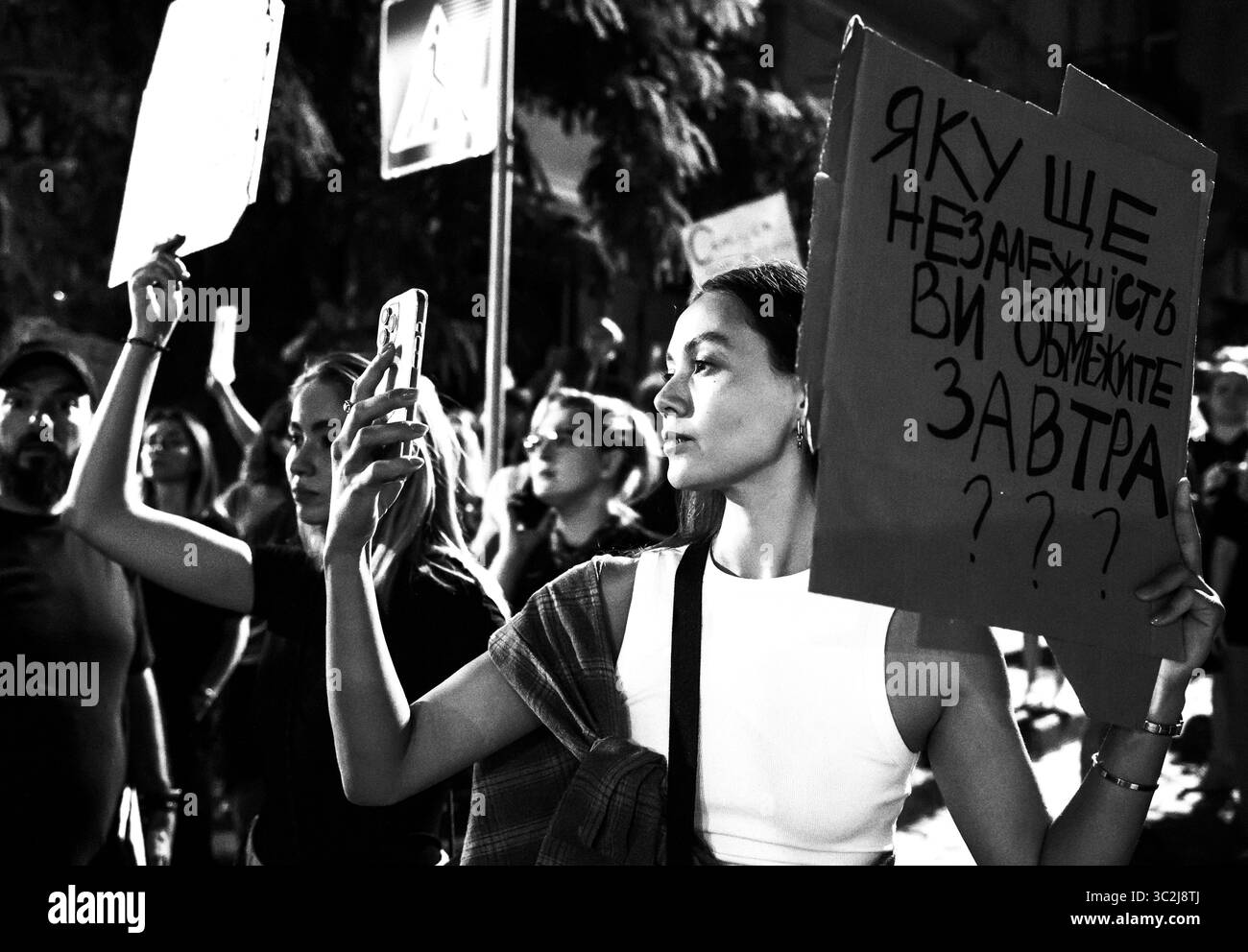 Protesters protest placard Black and White Stock Photos & Images - Alamy