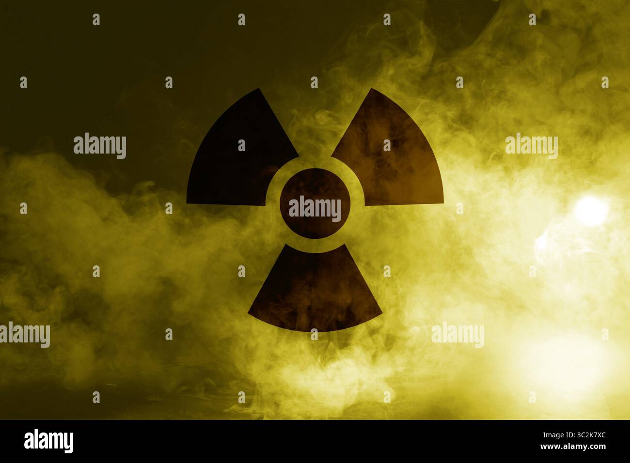 Radioactive sign and yellow toxic smoke against black background Stock ...