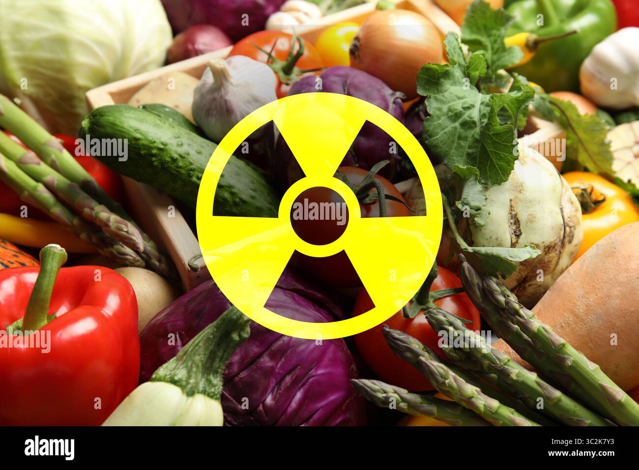 Fresh vegetables and radioactive sign. Environmental contamination ...