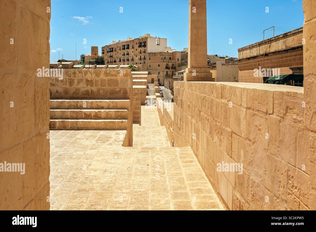 Ancient Maltese limestone fortification structures with steps and ...