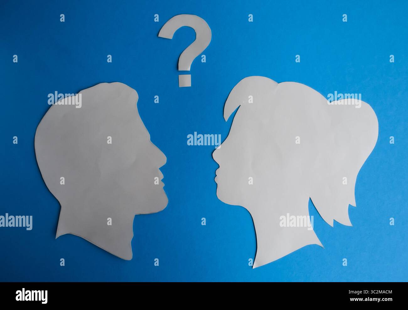 Question Mark Between Male and Female Silhouettes Stock Photo - Alamy