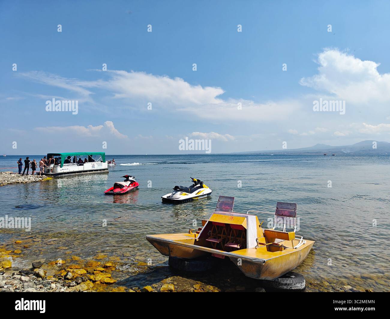 Sevan Lake, Armenia - July 19, 2025: Vibrant jet skis and boats are ...