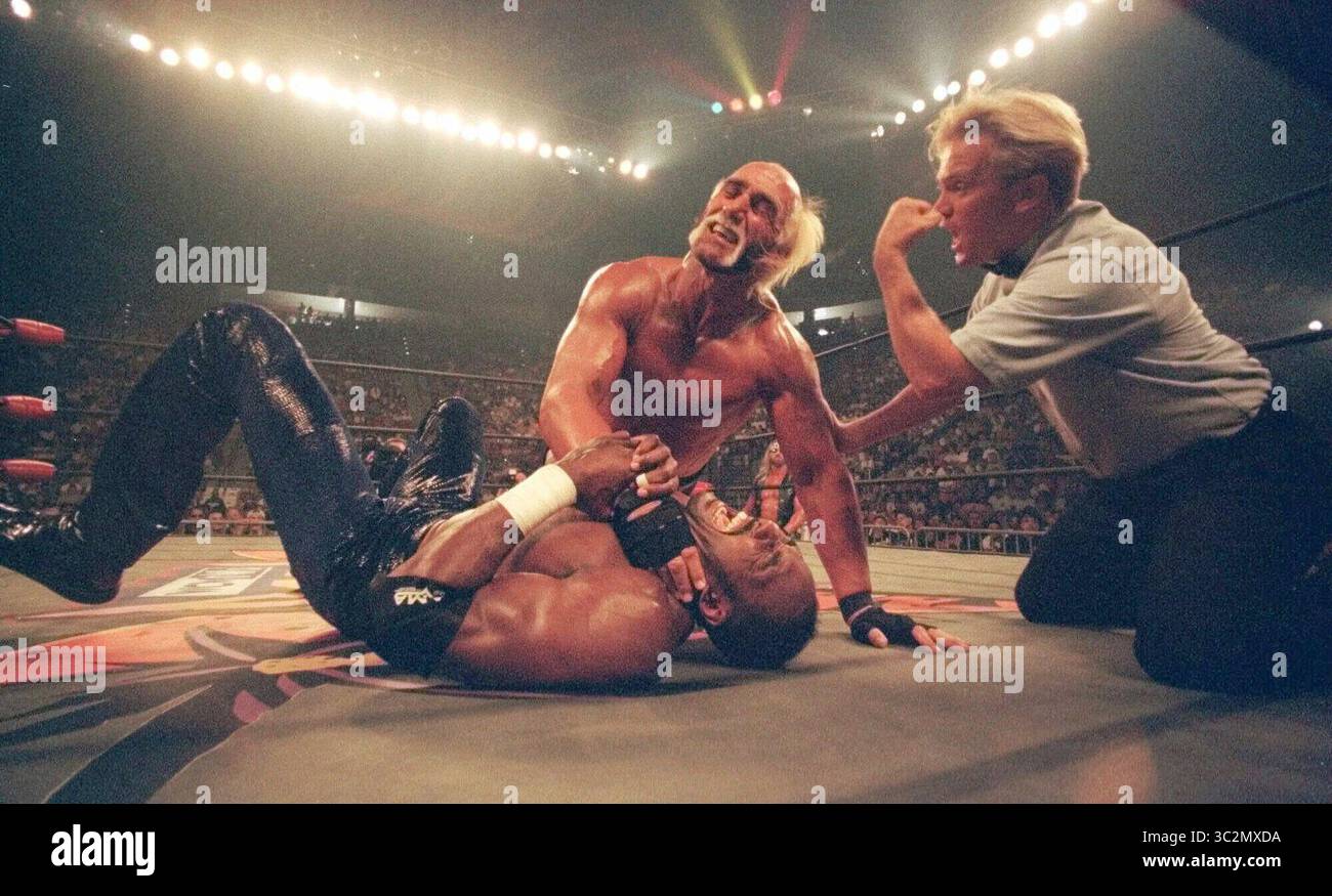 FILE - Hollywood Hulk Hogan puts a choke hold on the neck of Utah Jazz ...