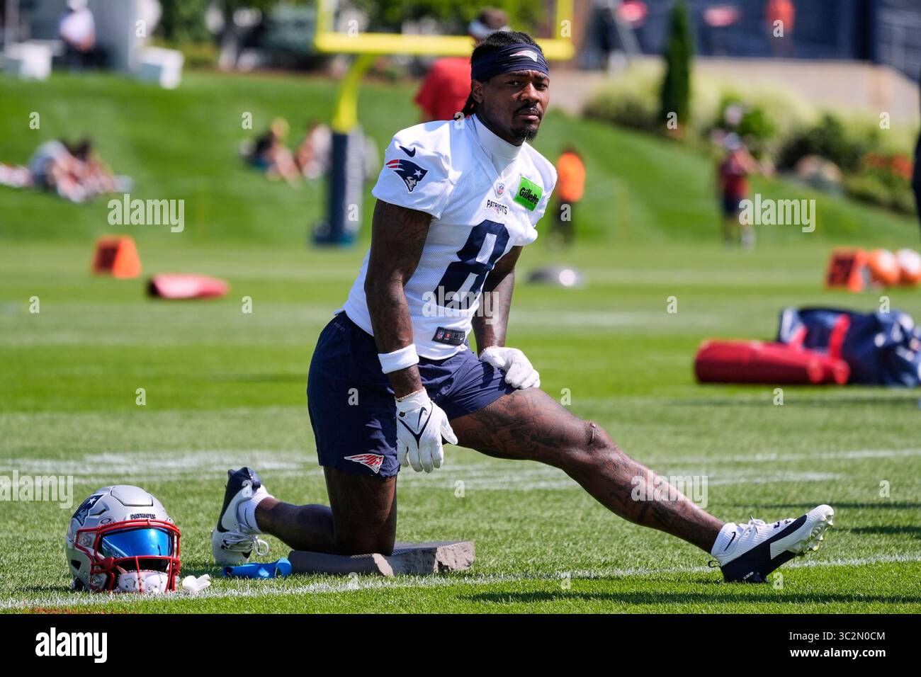 New England Patriots wide receiver Stefon Diggs stretches during ...