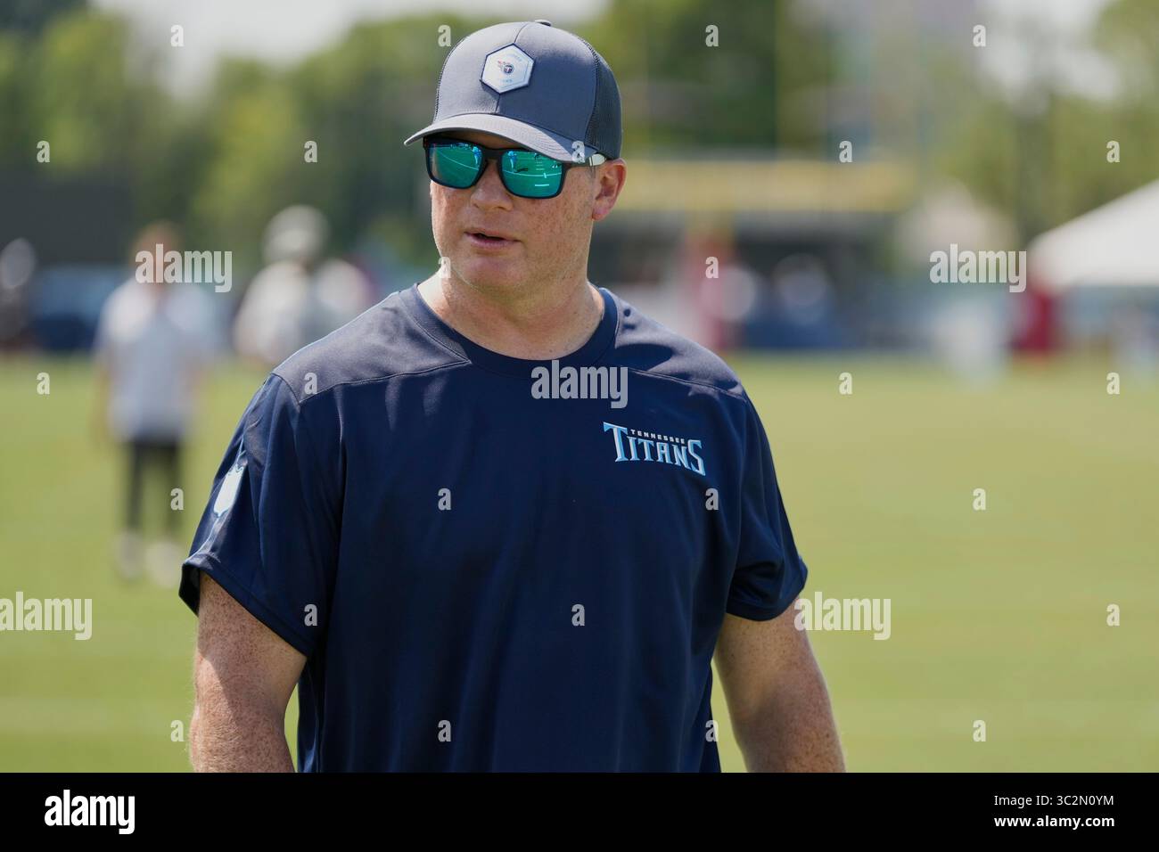 Tennessee Titans president of football operations Chad Brinker walks ...