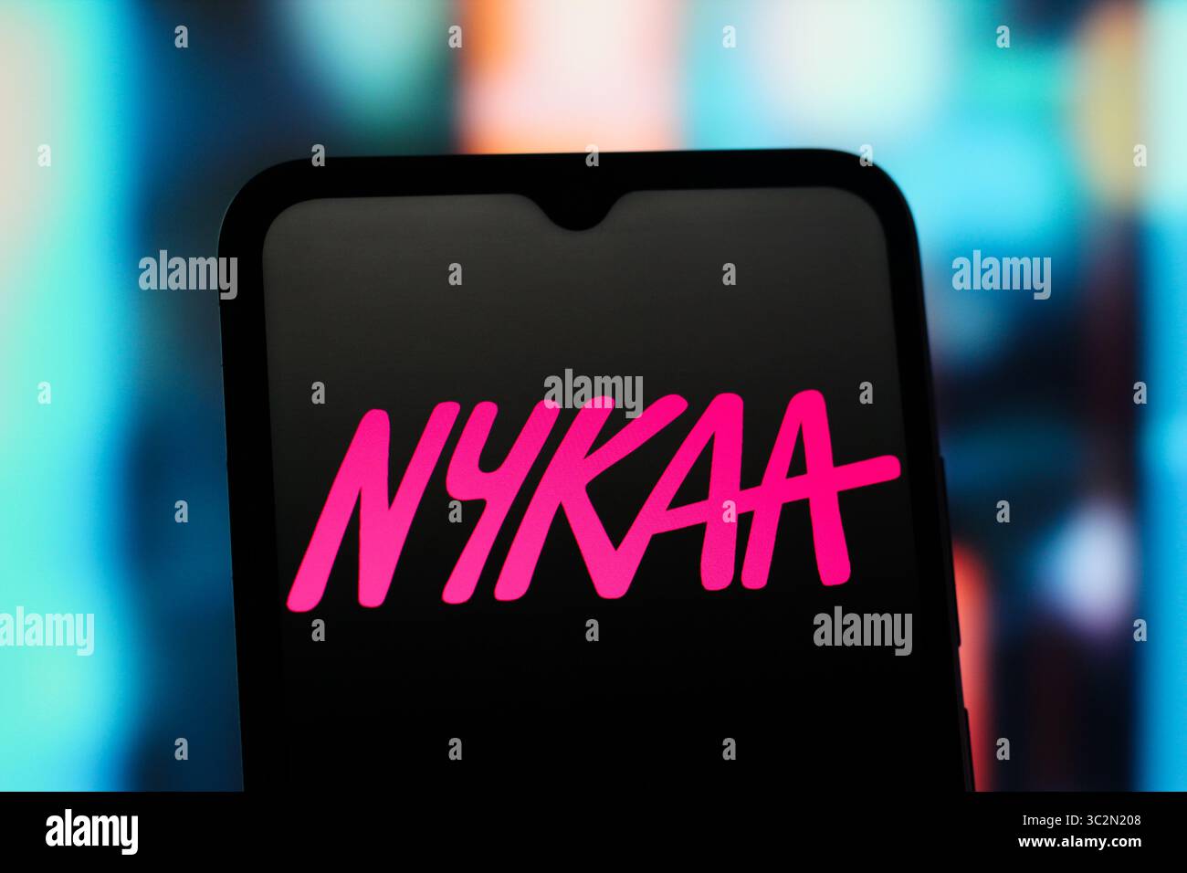 In this photo illustration, the Nykaa logo is seen displayed on a ...