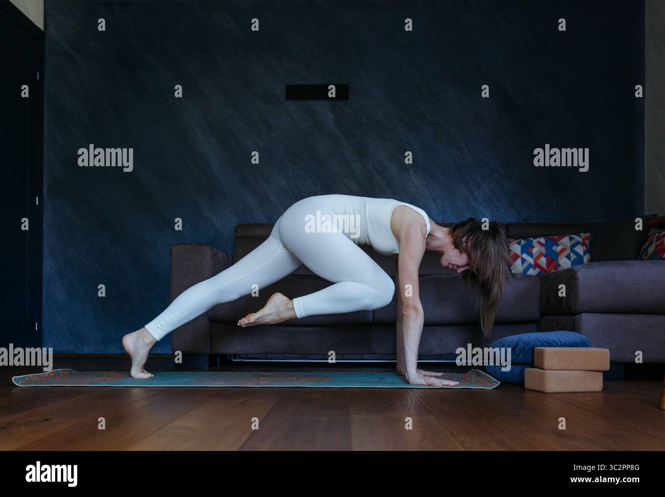 Woman practicing forearm plank hi-res stock photography and images - Alamy