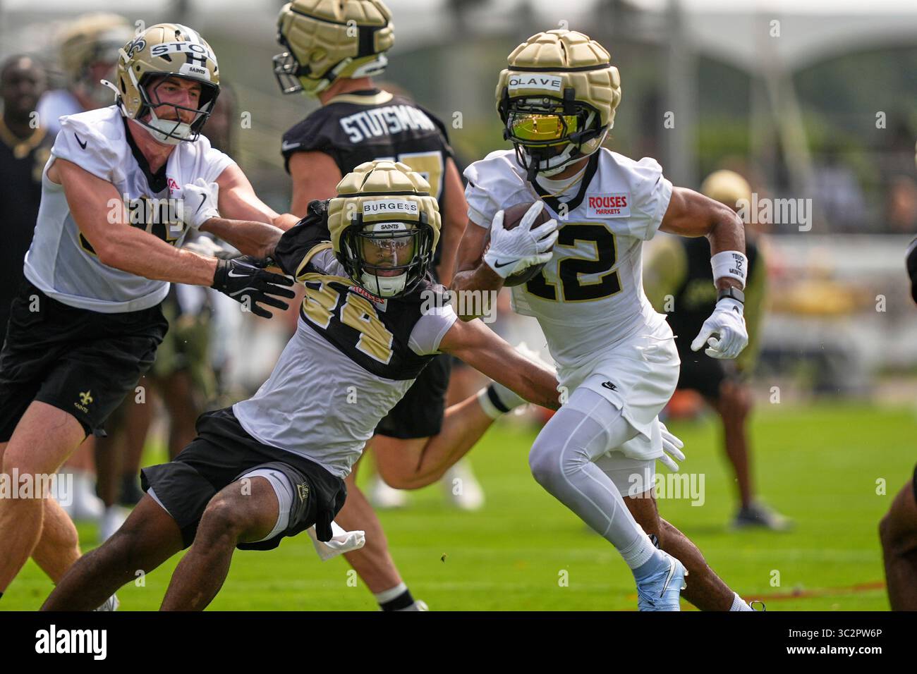 New Orleans Saints wide receiver Chris Olave (12) and safety Terrell ...