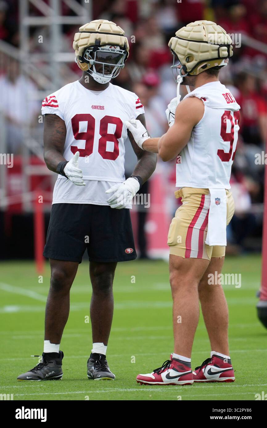 San Francisco 49ers defensive lineman Mykel Williams (98) talks with ...