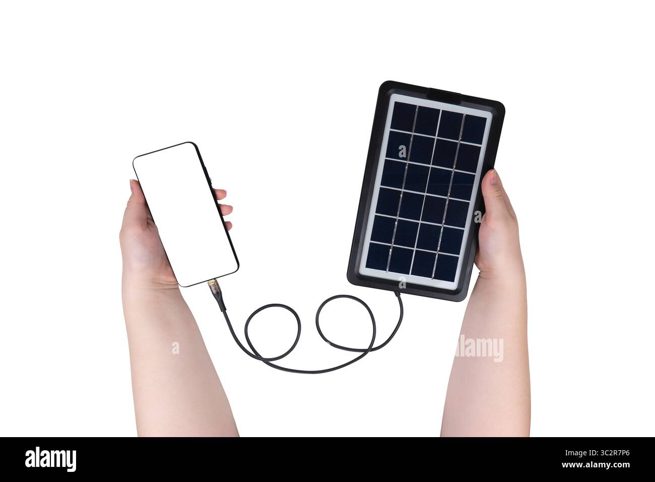 Hands holding smartphone connected to portable solar panel with USB ...