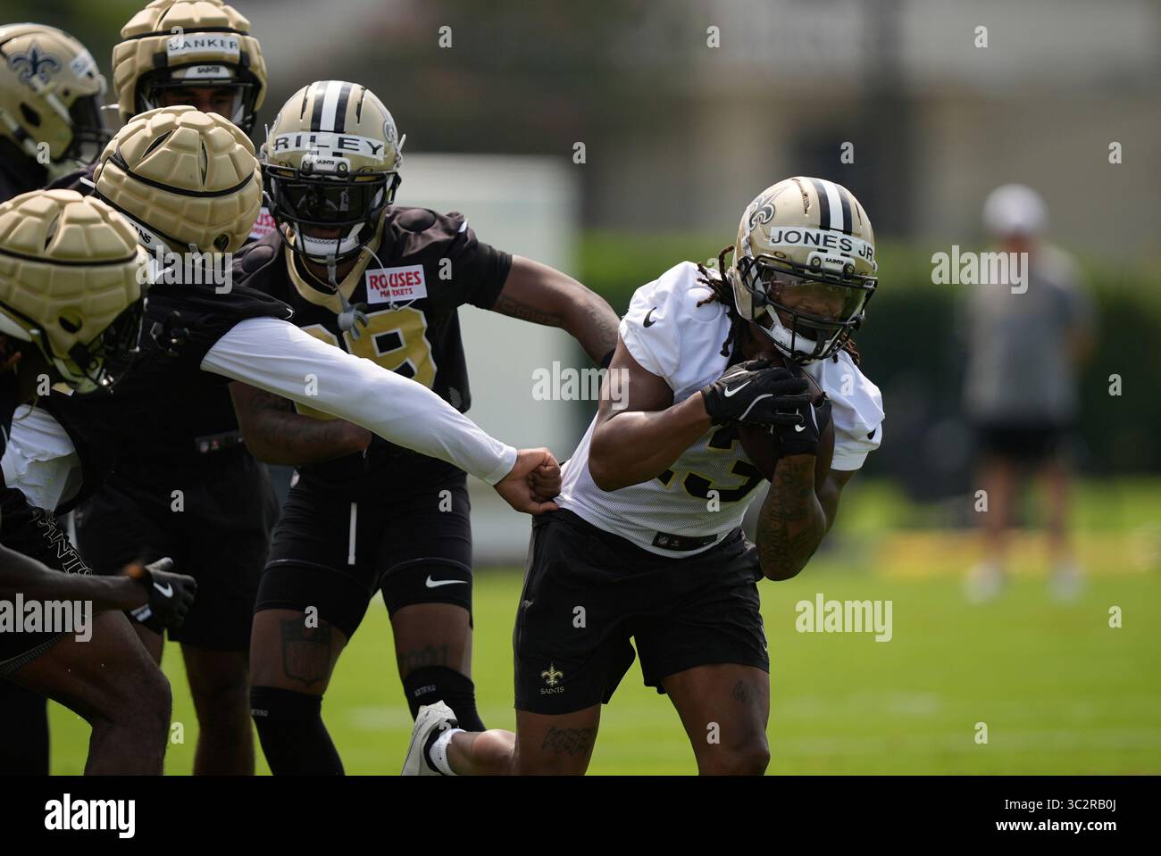 New Orleans Saints running back Velus Jones Jr. (13) goes through ...