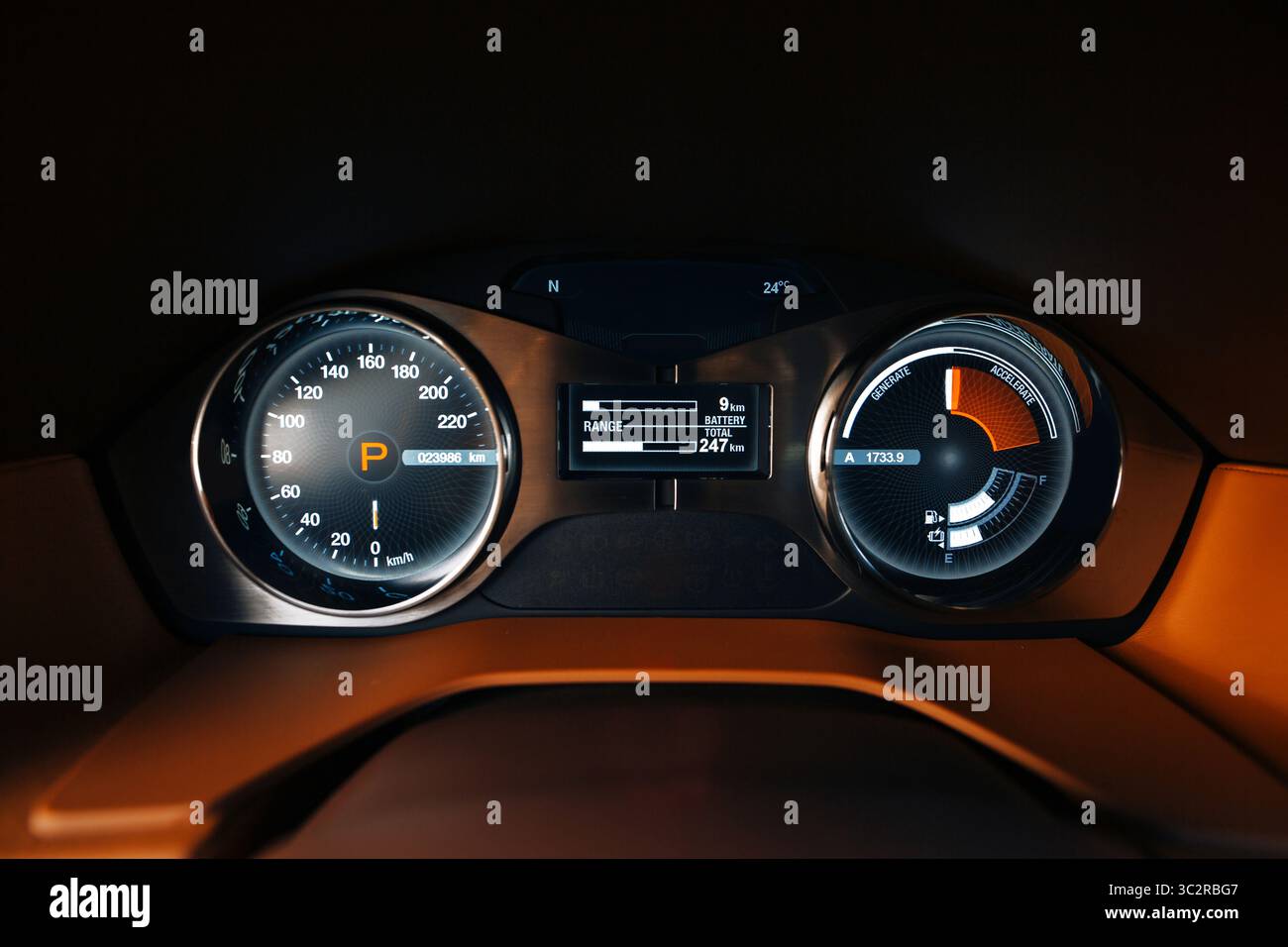 Sports car digital tachometer and dashboard with backlight. Close-up ...