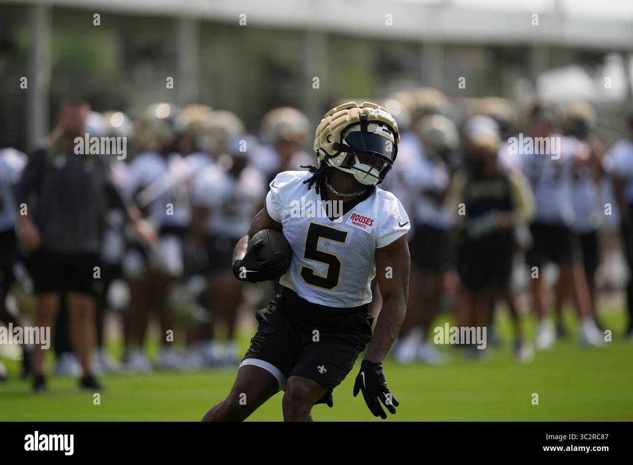 New Orleans Saints running back Kendre Miller (5) goes through drills ...