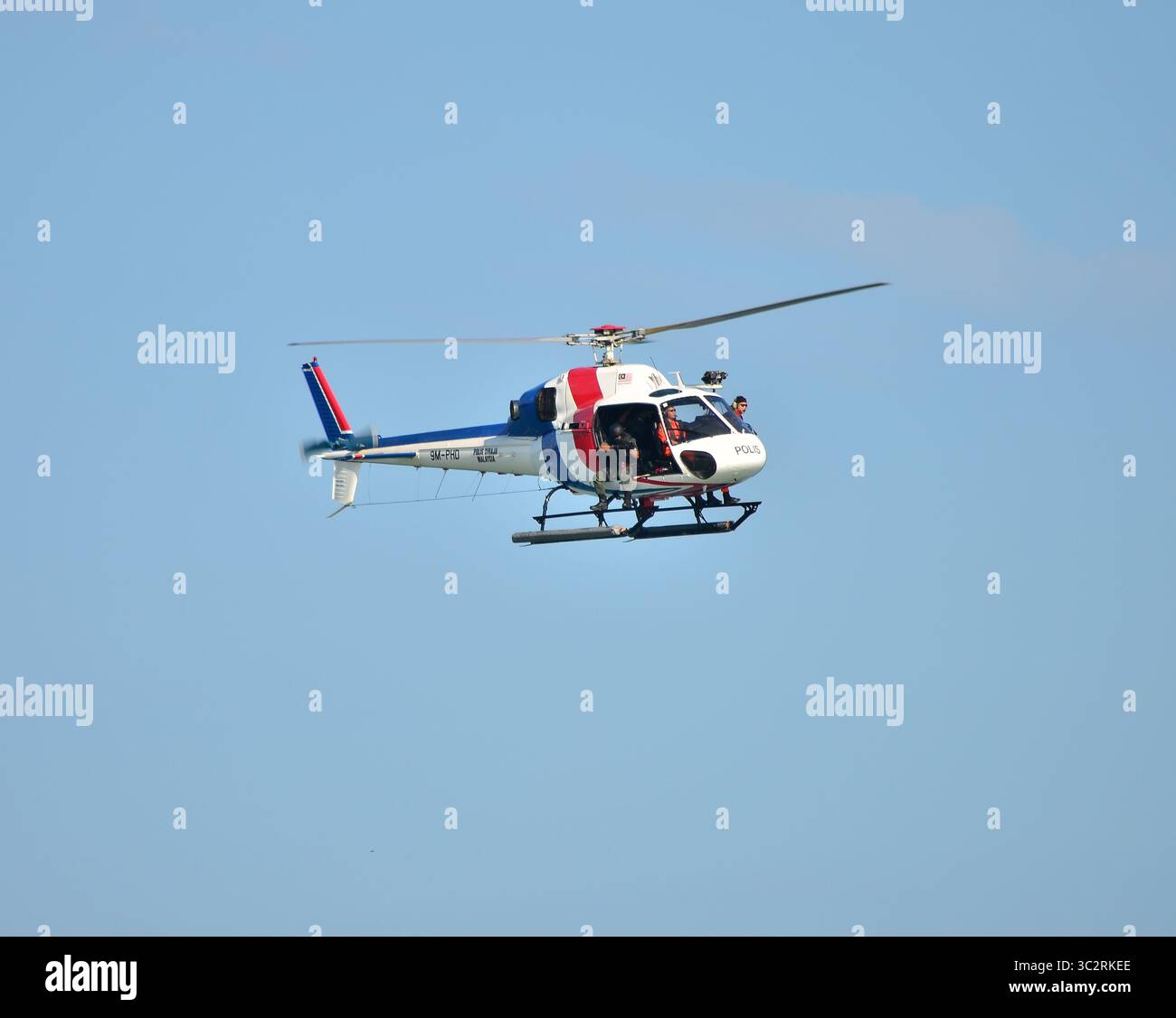 An image of police helicopter in flight during an aerial patrol mission ...