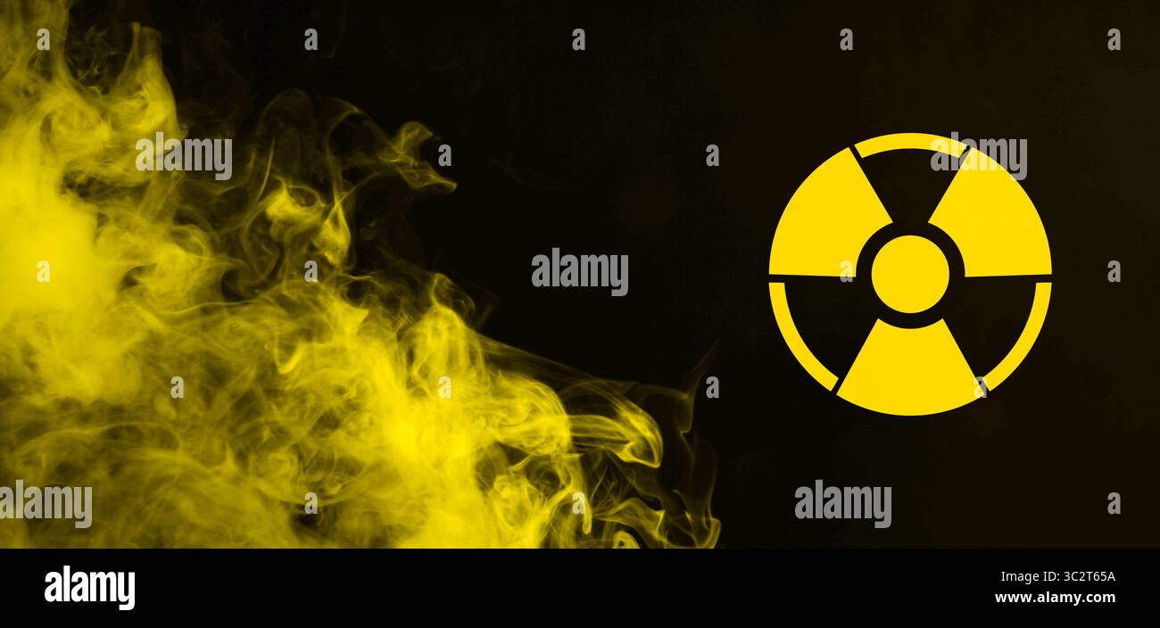 Radioactive sign and yellow toxic smoke against black background ...