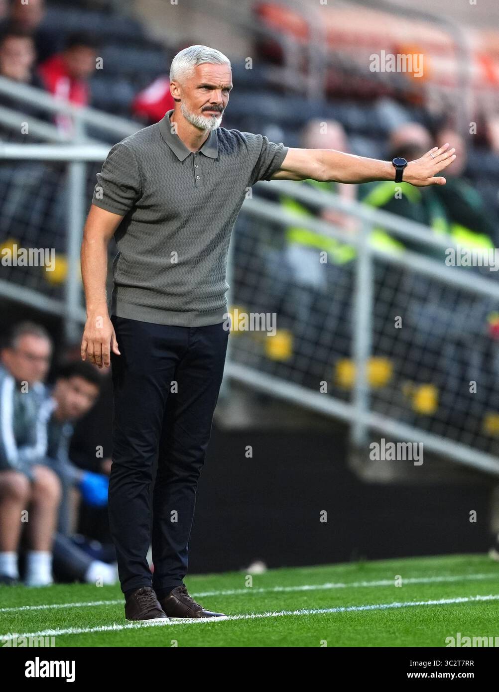 Dundee United manager Jim Goodwin gestures on the touchline during the ...