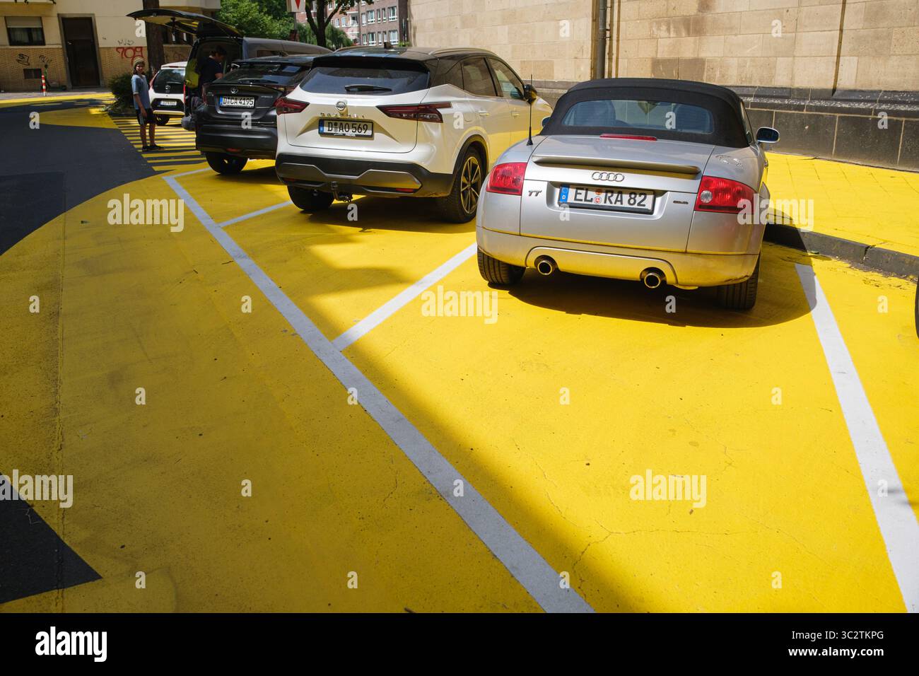 Yellow zones painted on the asphalt for pedestrian safety Stock Photo ...