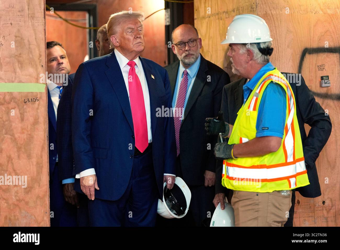 President Donald Trump, left, and Russell Vought, director of the ...