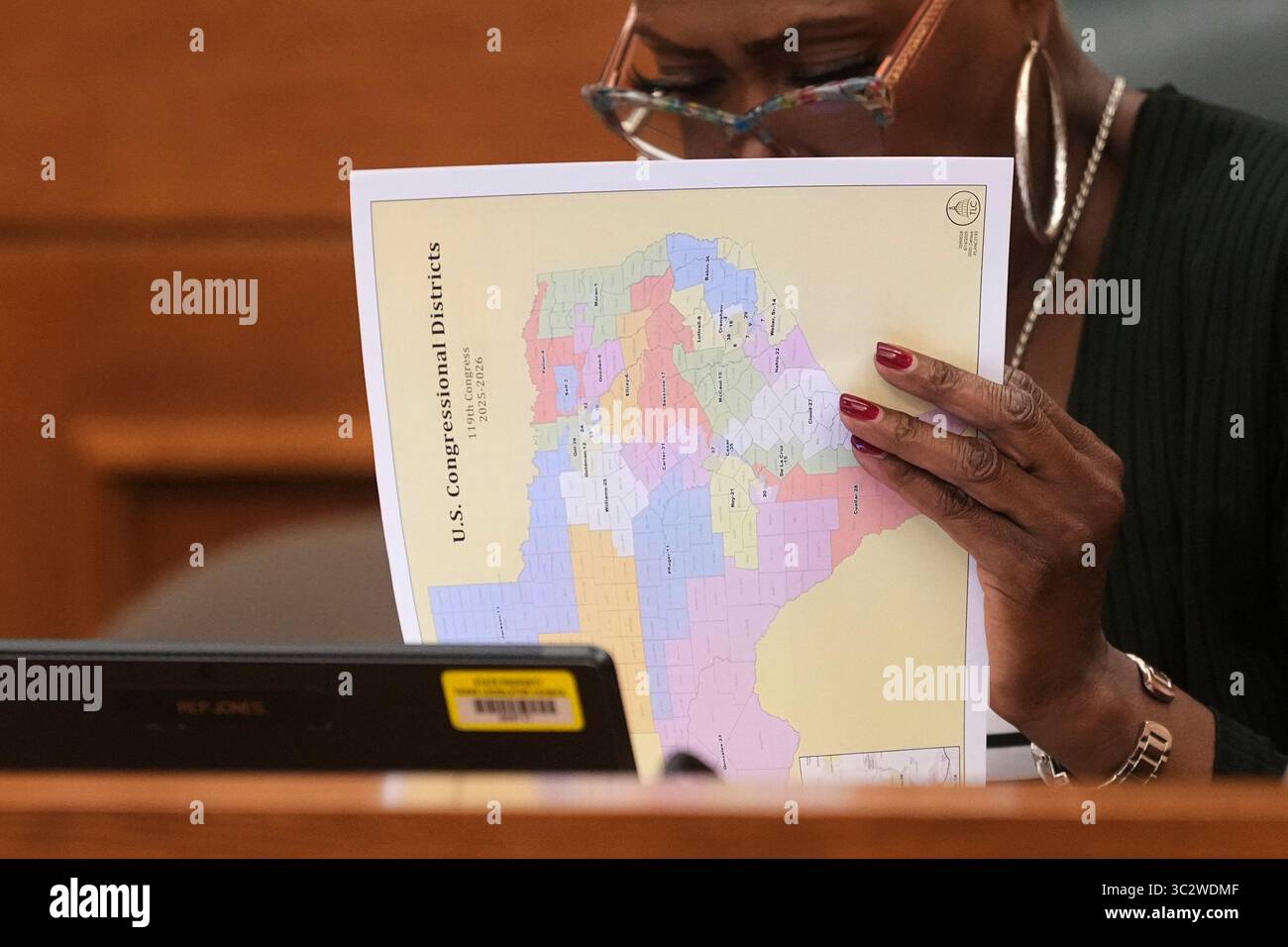 Texas state Rep. Jolanda "Jo" Jones looks through U.S. Congressional ...