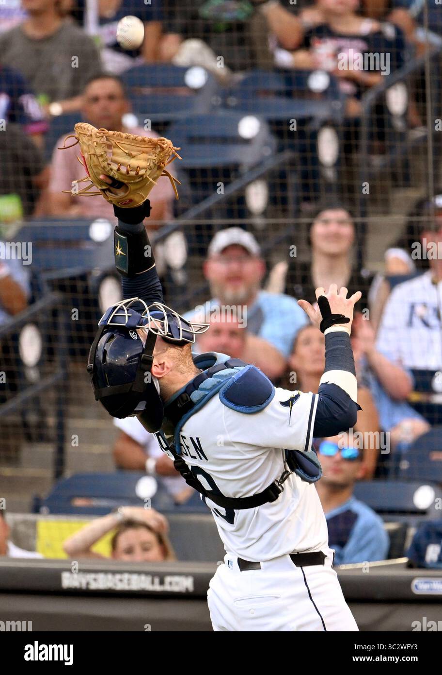 Tampa Bay Rays catcher Danny Jansen catches a pop up during the first ...