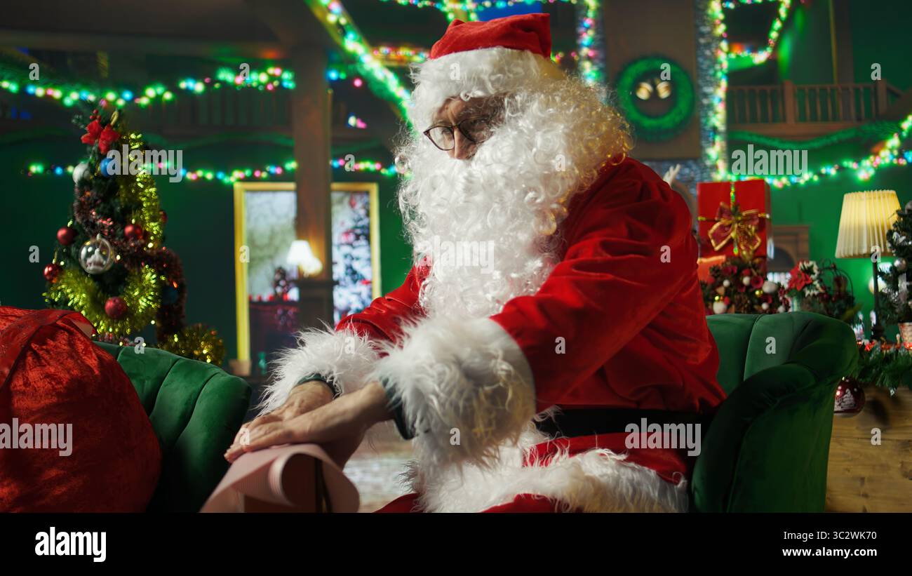 Santa Claus performer during winter season spreading holiday cheer ...