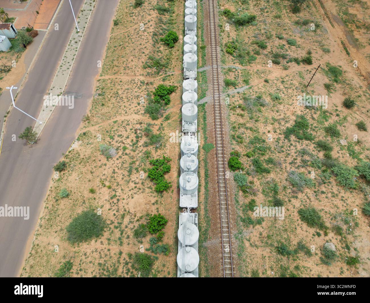 aerial view of oil tanker , cement carts wagons on a railroad ...