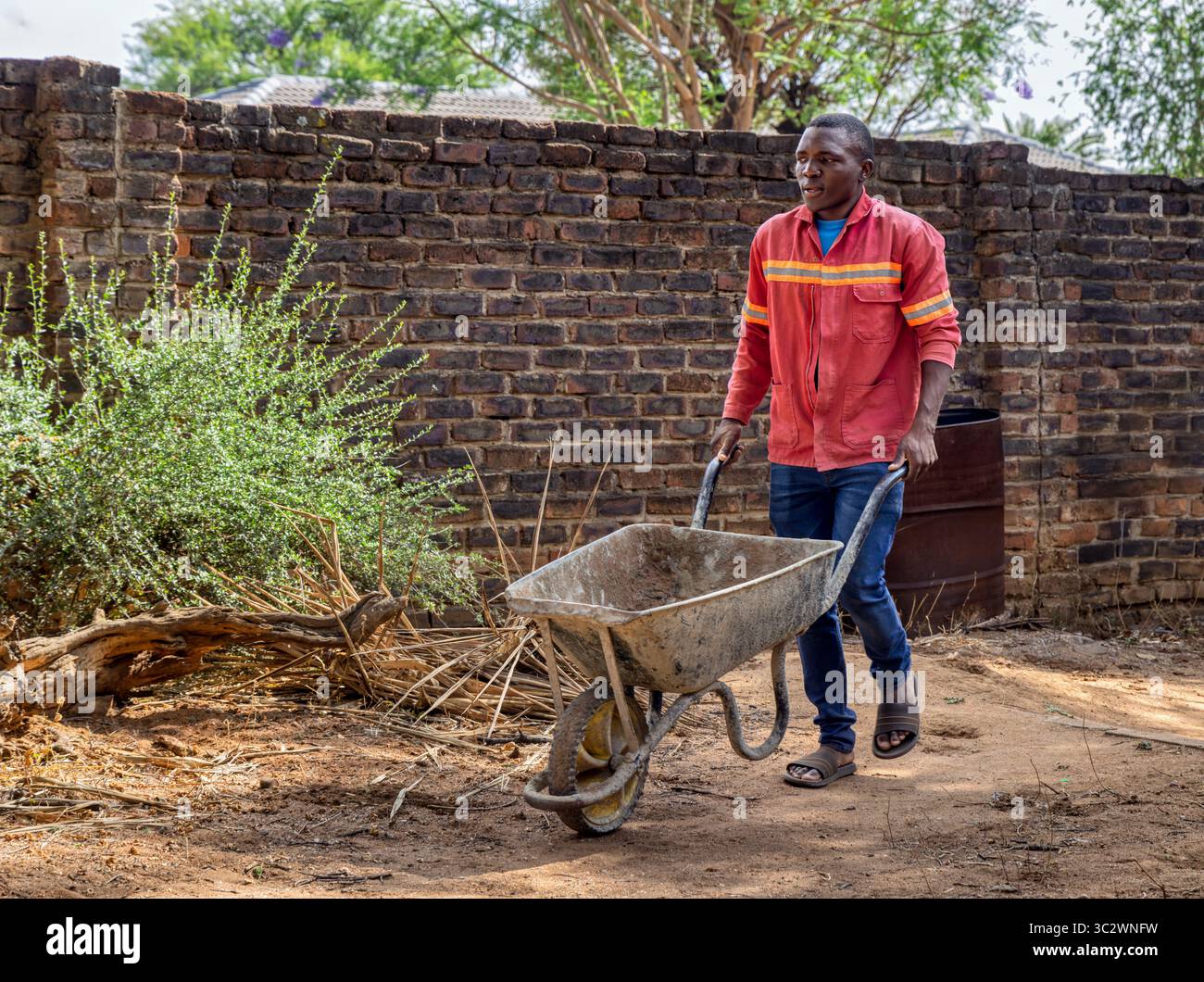 Smiley work wheelbarrow hi-res stock photography and images - Alamy