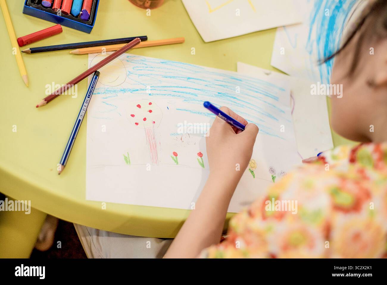 Child drawing with paints on paper, kid draw in kindergarten, preschool ...