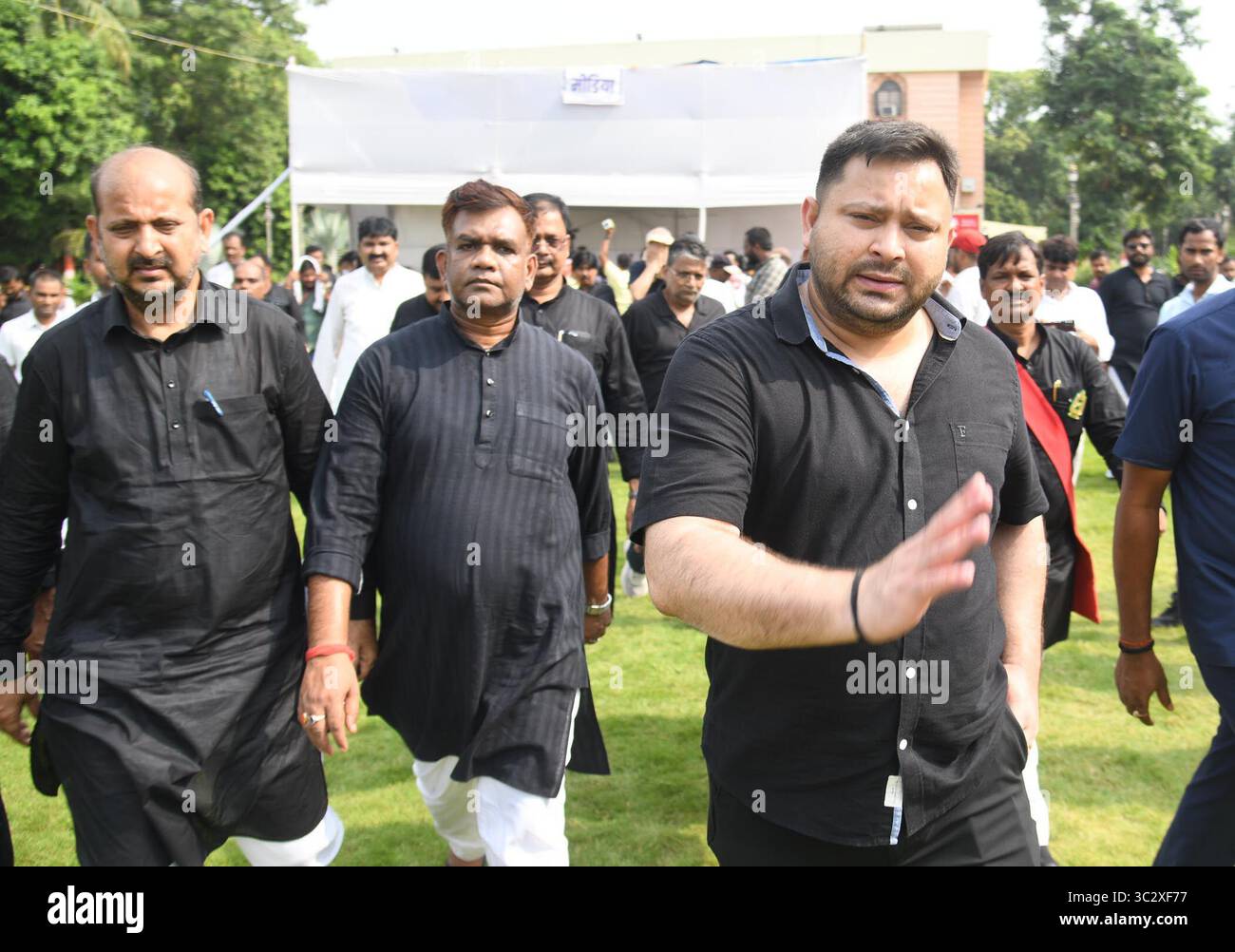PATNA, INDIA - JULY 24: Leader of Opposition Tejashwi Yadav with RJD legislators coming out ...