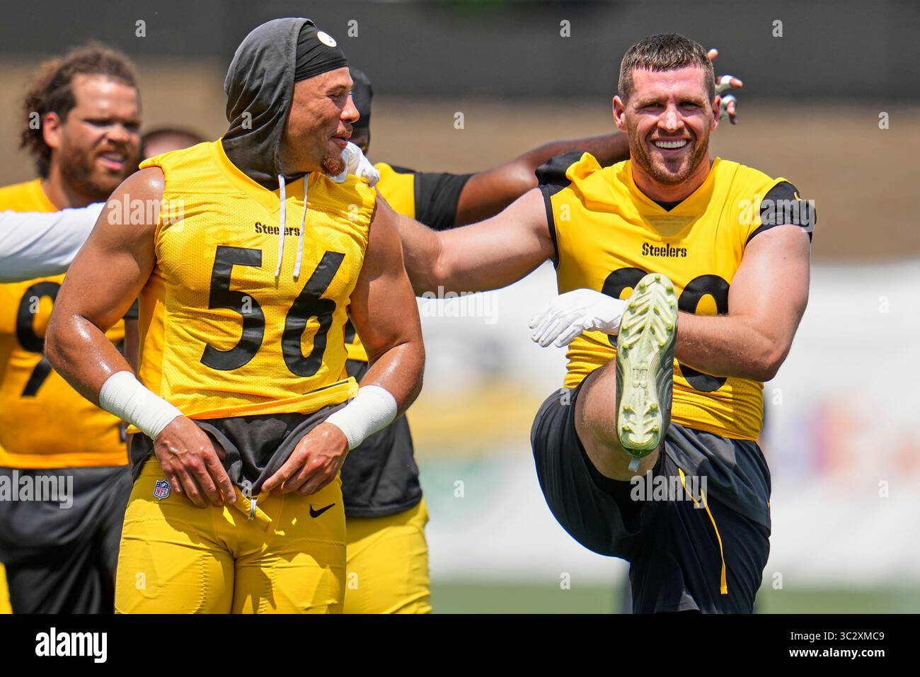 Pittsburgh Steelers linebackers T.J. Watt, right, and Alex Highsmith ...