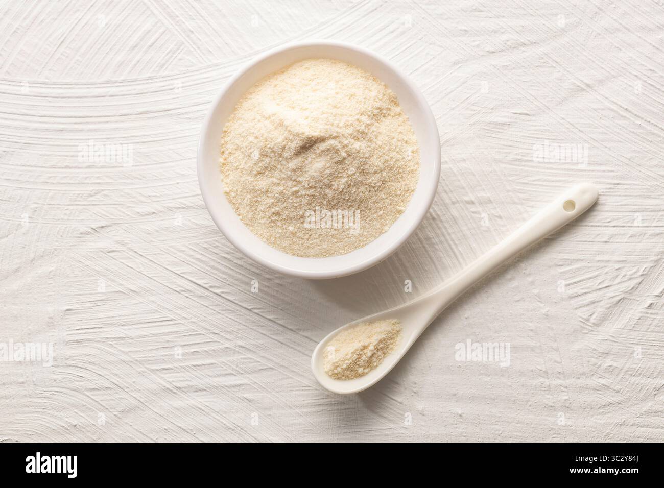 hydrolyzed collagen powder in bowl and spoon - Organic gelatin powder ...