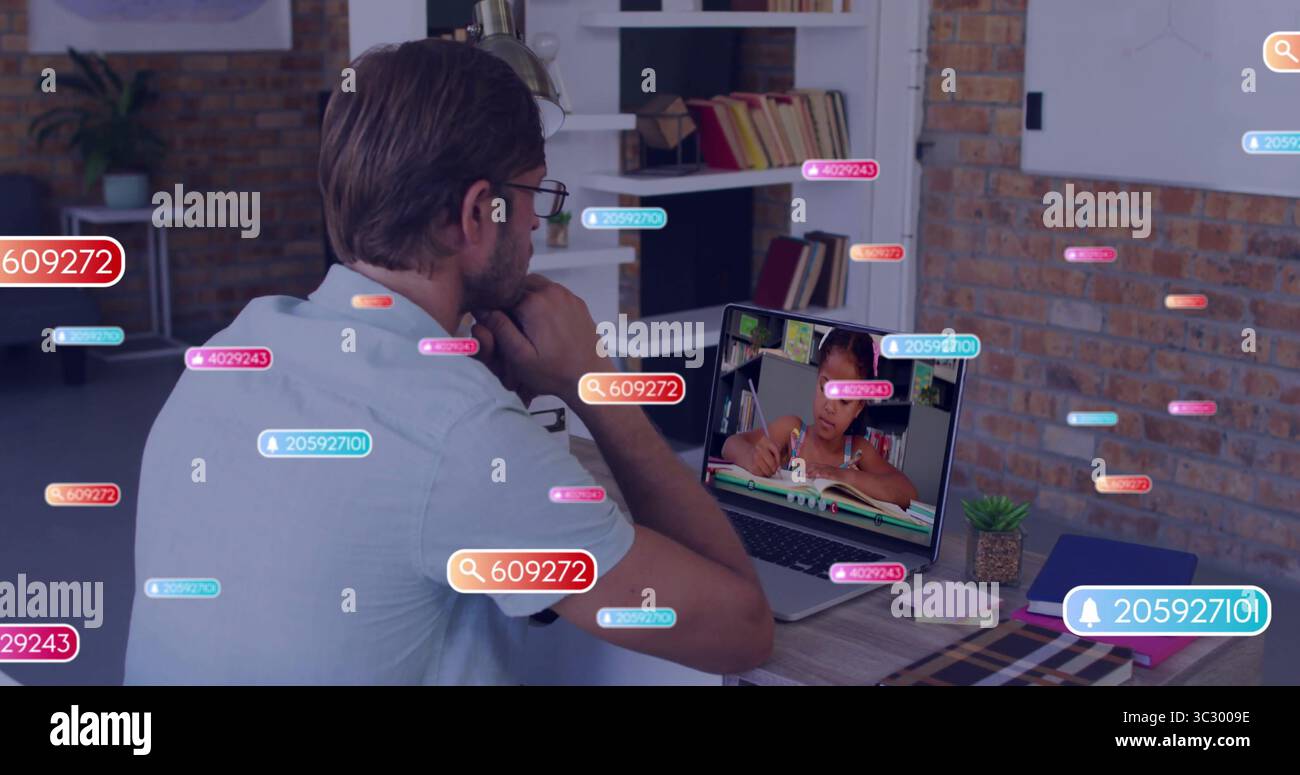 Tutor guiding student taking notes on laptop in home office, with ...