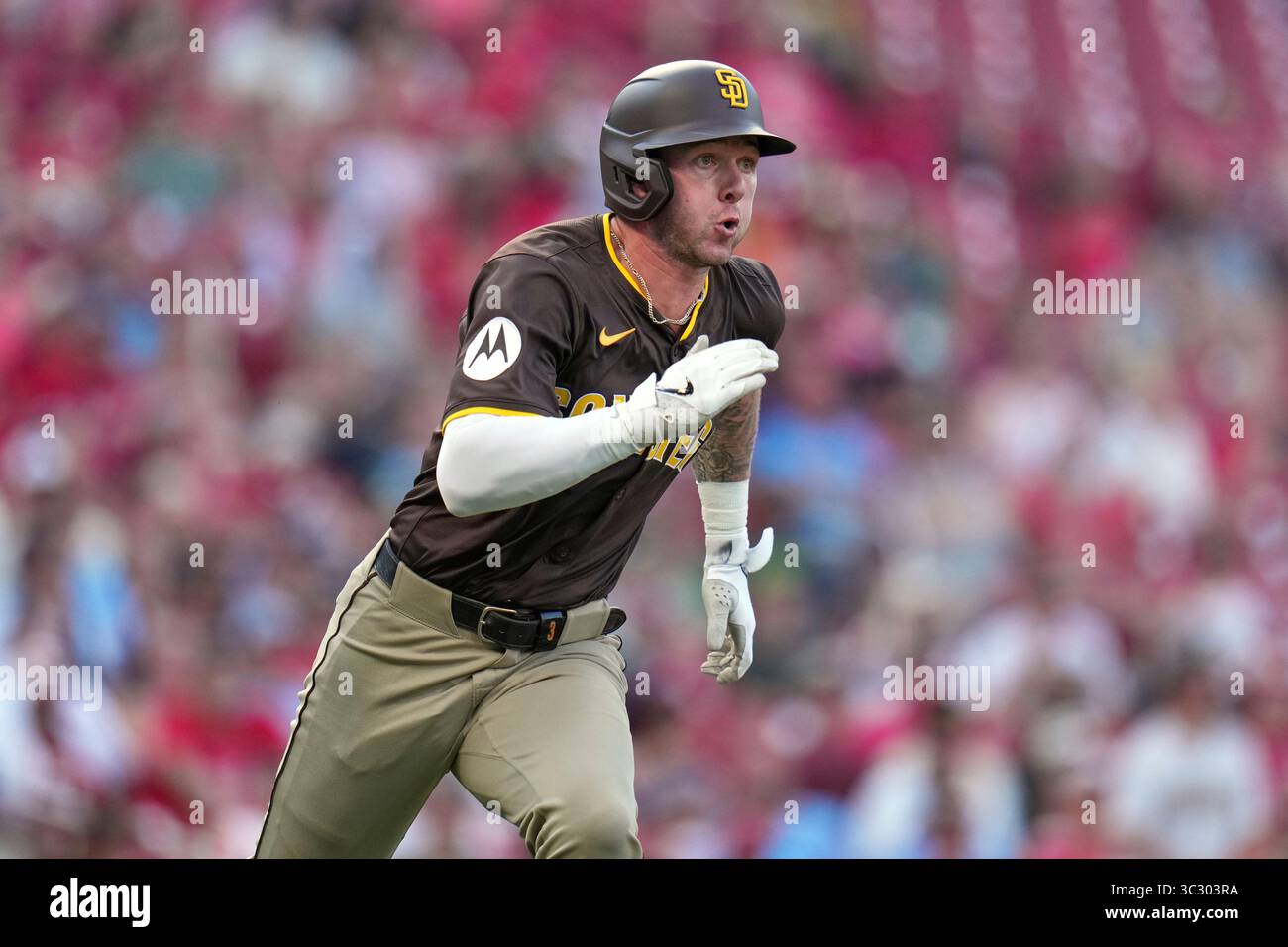 San Diego Padres' Jackson Merrill heads to first on an RBI single ...