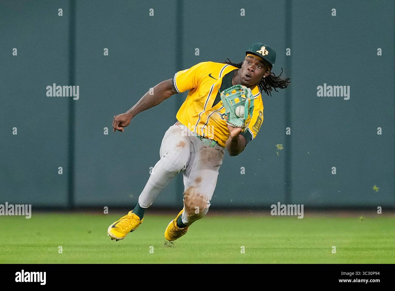 Athletics center fielder Lawrence Butler catches a fly ball by Houston ...