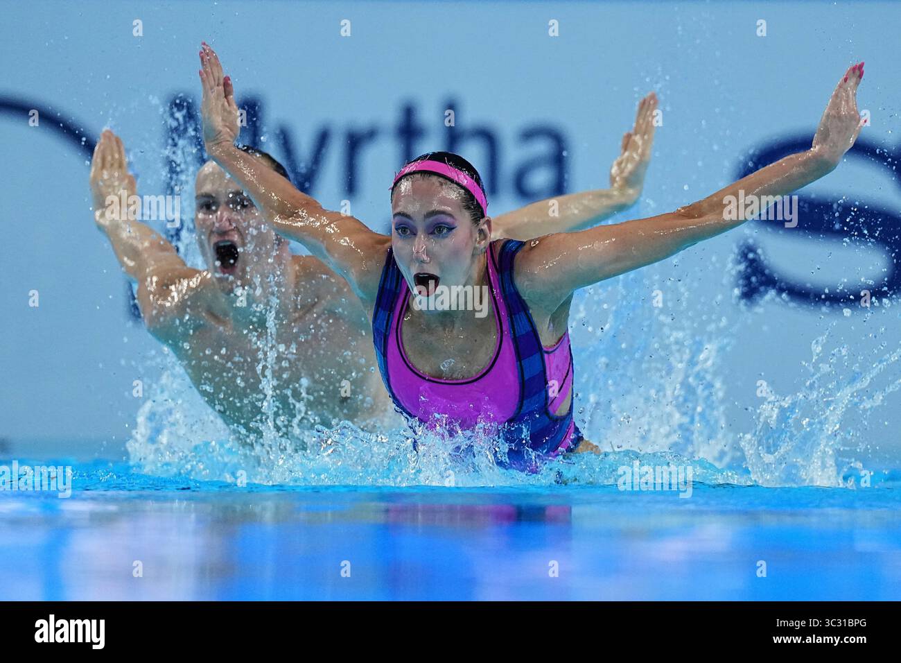 Olesia Platonova and Aleksandr Maltsev of Russia compete in the mixed ...