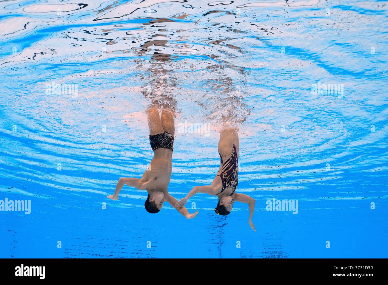 Guo Muye and Liu Jinhan of China compete in the mixed duet free final ...