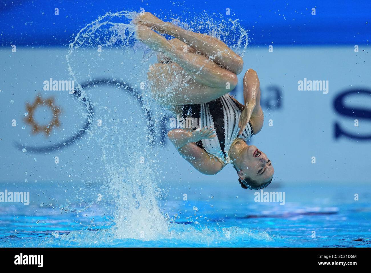 Isabelle Thorpe and Ranjuo Tomblin of Britain compete in the mixed duet ...