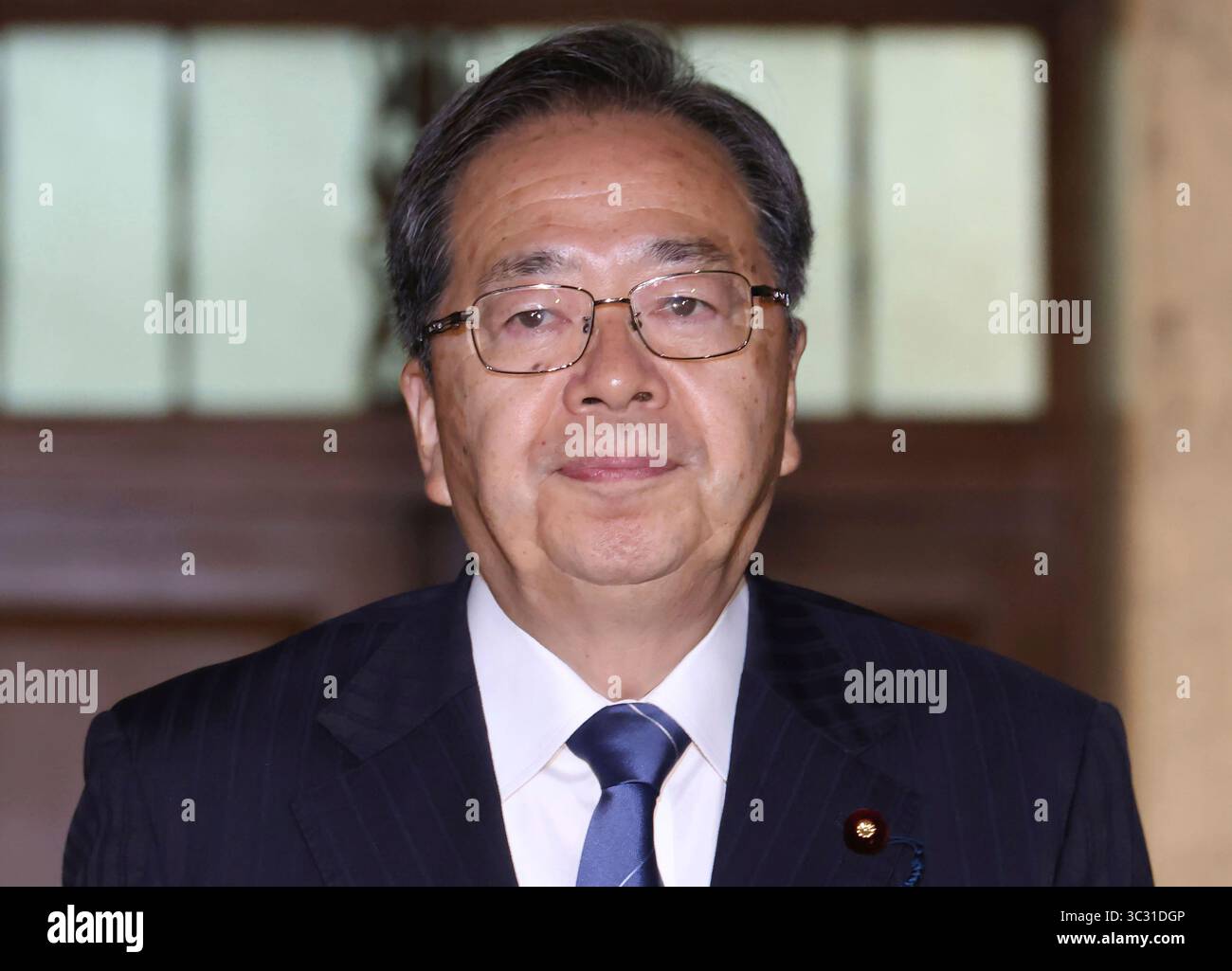 Komeito leader Tetsuo SAITO attends a meeting between the leaders of ...