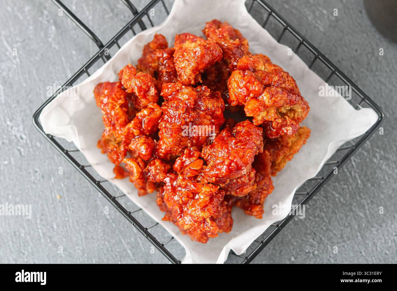 Top view of Yangnyeom Chicken, a popular Korean fried chicken coated in ...