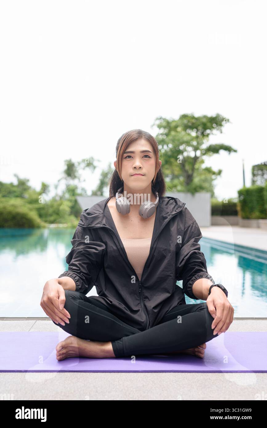 Woman performing morning yoga hi-res stock photography and images - Alamy
