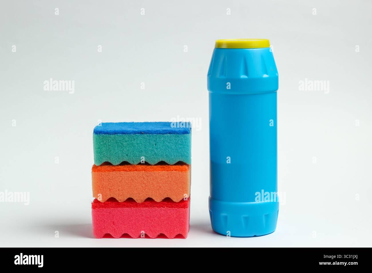 Cleaning concept. Detergent bottle, sponges on white background Stock ...
