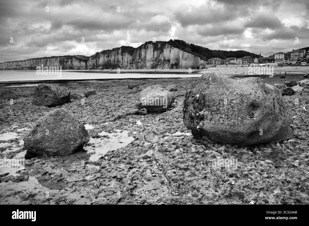 Steep coast, cliffs, coastal landscape, rocks on the beach, pebbles ...