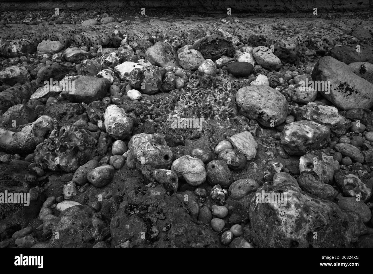Pebbles, stones, pebbles on the beach, black and white, Yport, chalk ...
