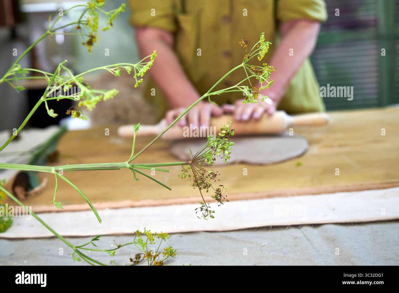 Rolling out clay sheet hi-res stock photography and images - Alamy