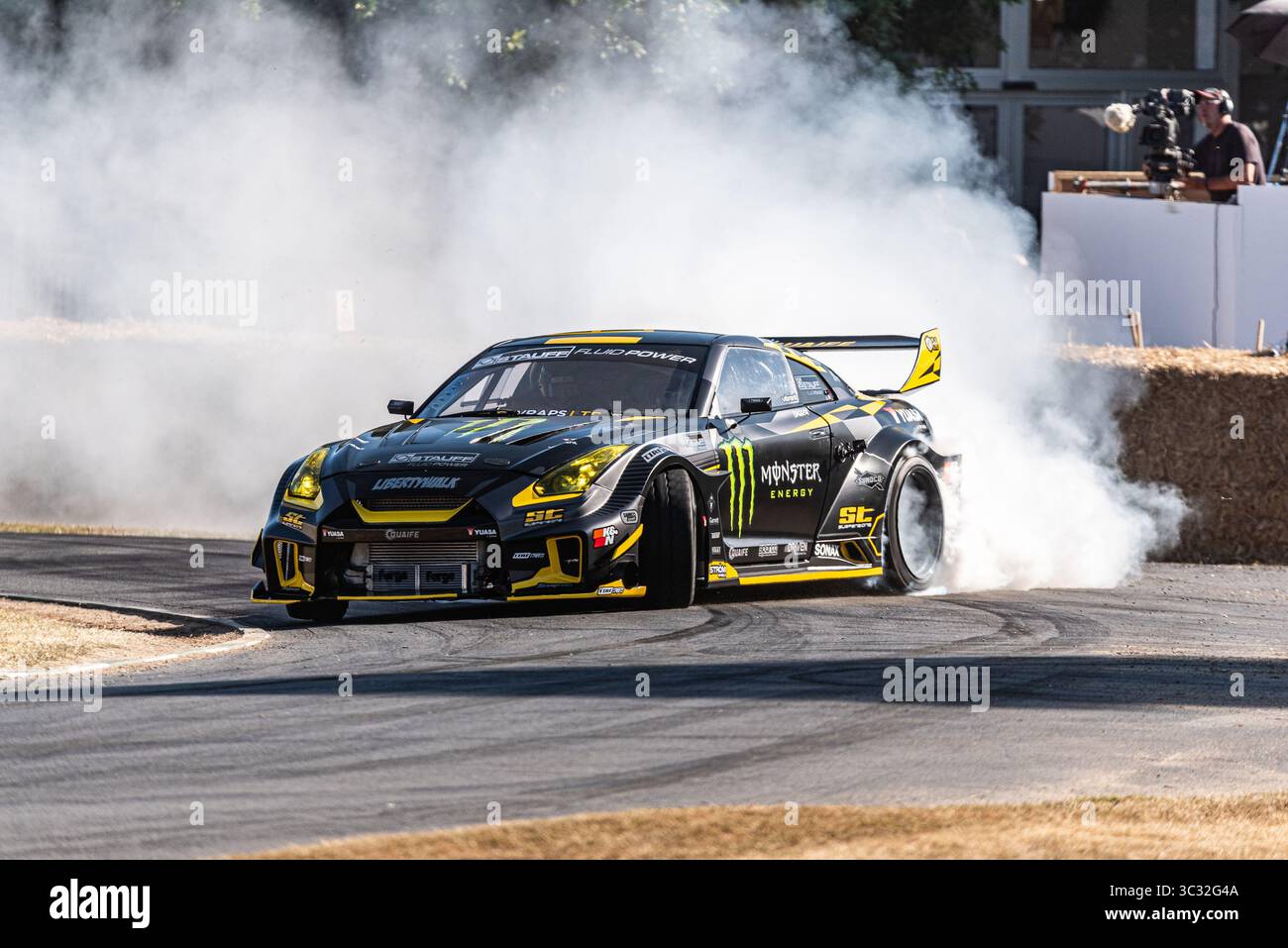 Nissan GT-R drift car, drifting, driving up the hillclimb track at the ...