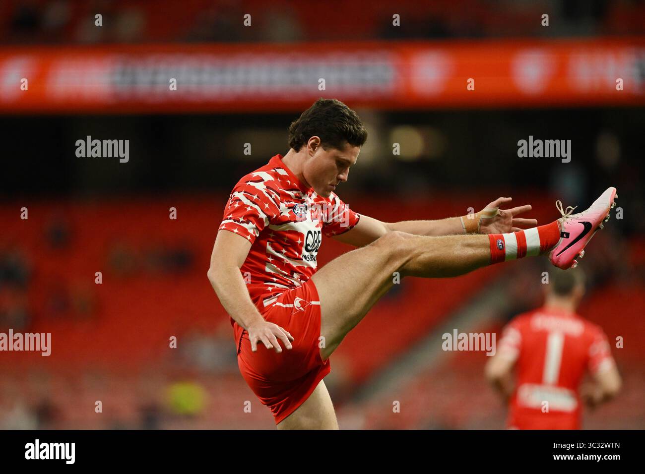Hayden McLean of the Swans warms up ahead of the AFL Round 20 match ...