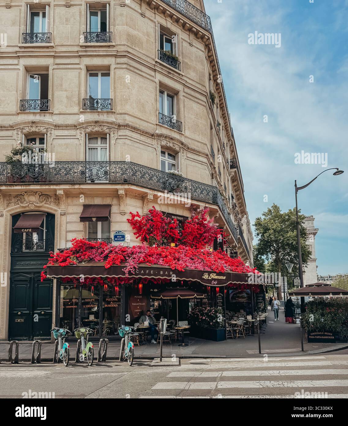Cafe in traditional looking building on street in Paris, France Stock ...