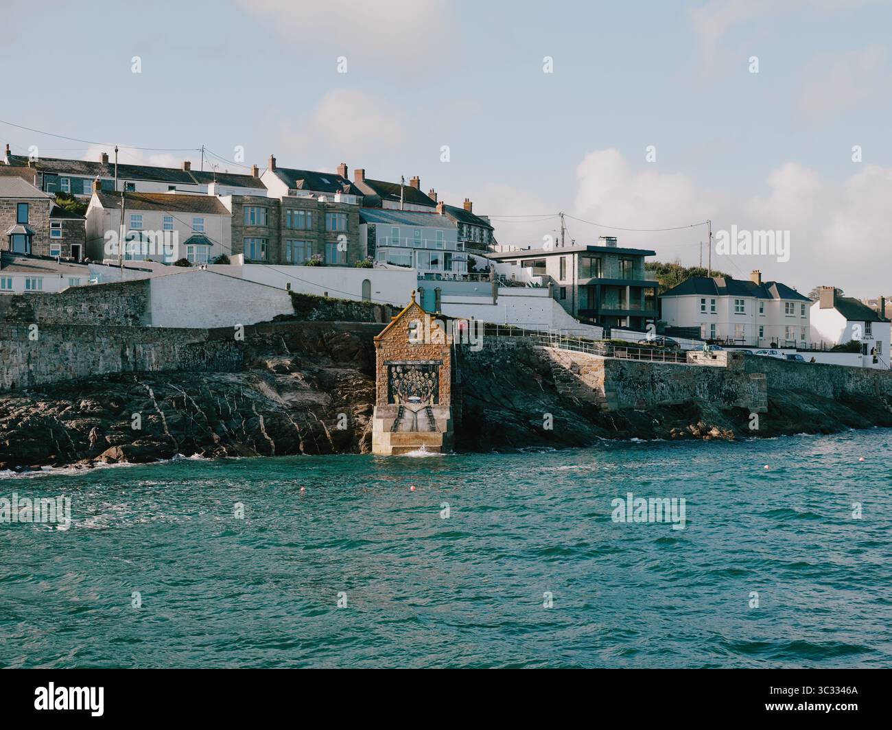 The Old Lifeboat House and painted mural doors in Porthleven fishing ...